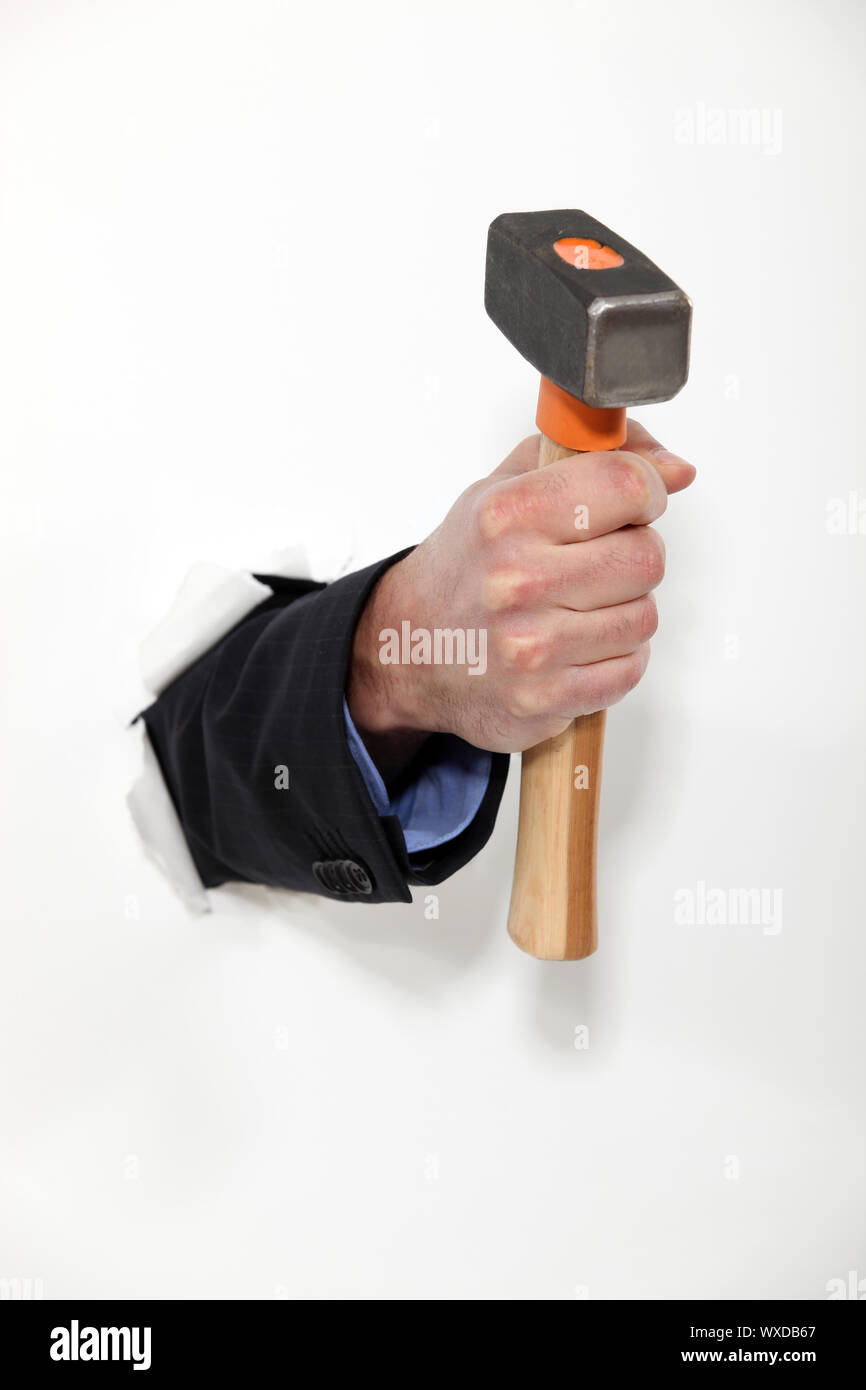 male hand holding hammer Stock Photo - Alamy