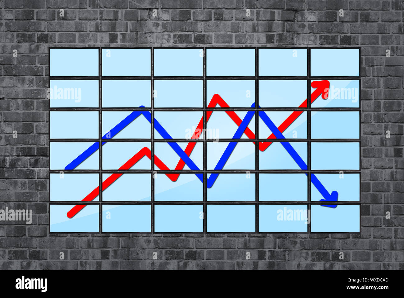 flat panels with growth chart on brick wall Stock Photo - Alamy