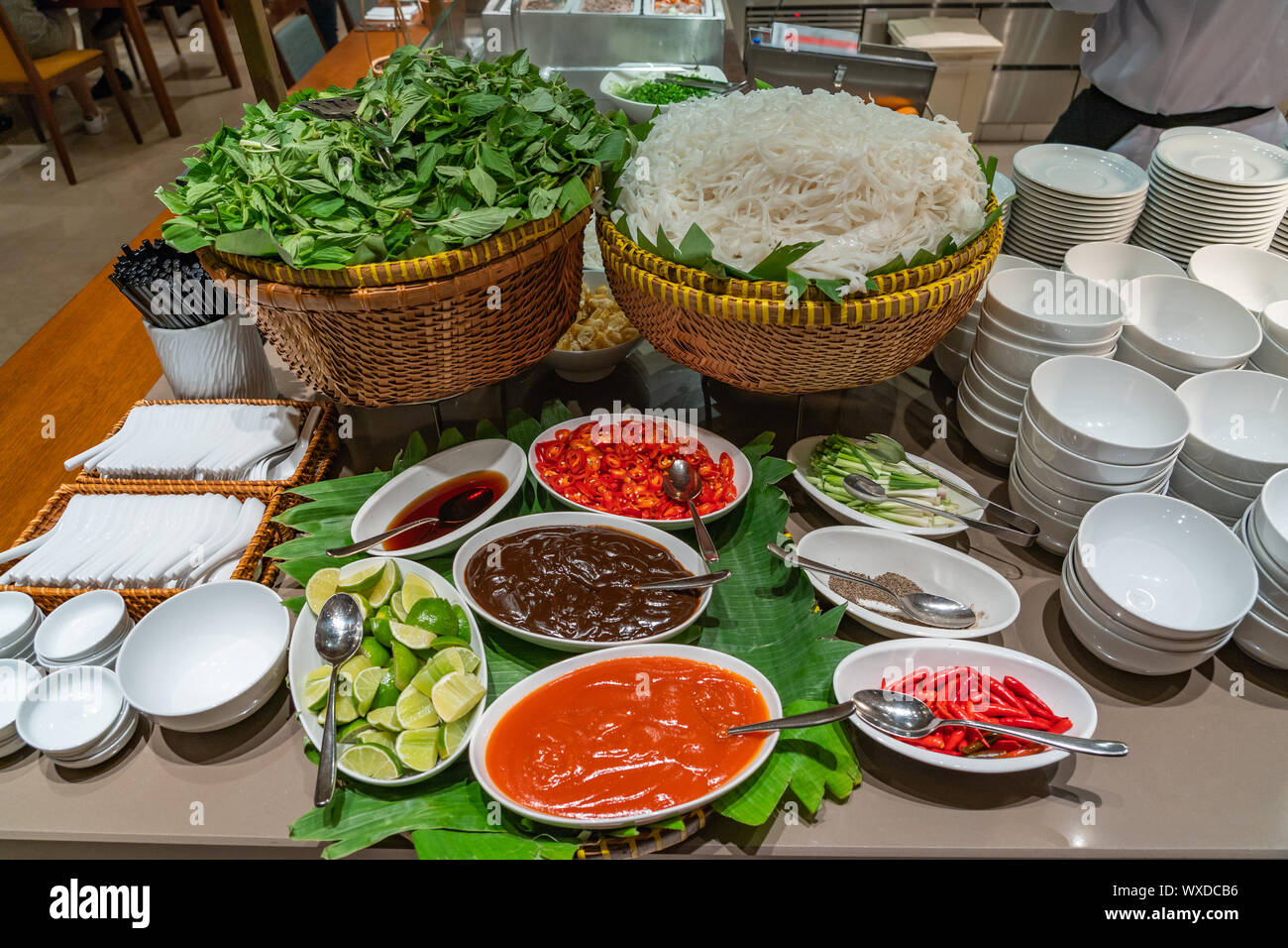 Traditional Vietnamese Pho noodle soup counter in Asian restaurant ...