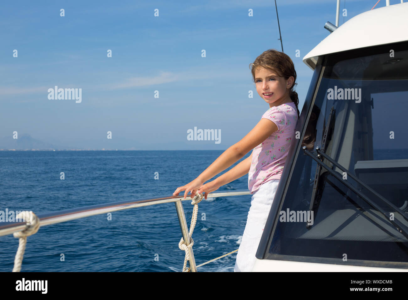 child happy girl sailing happy boat at blue sea ocean Stock Photo - Alamy