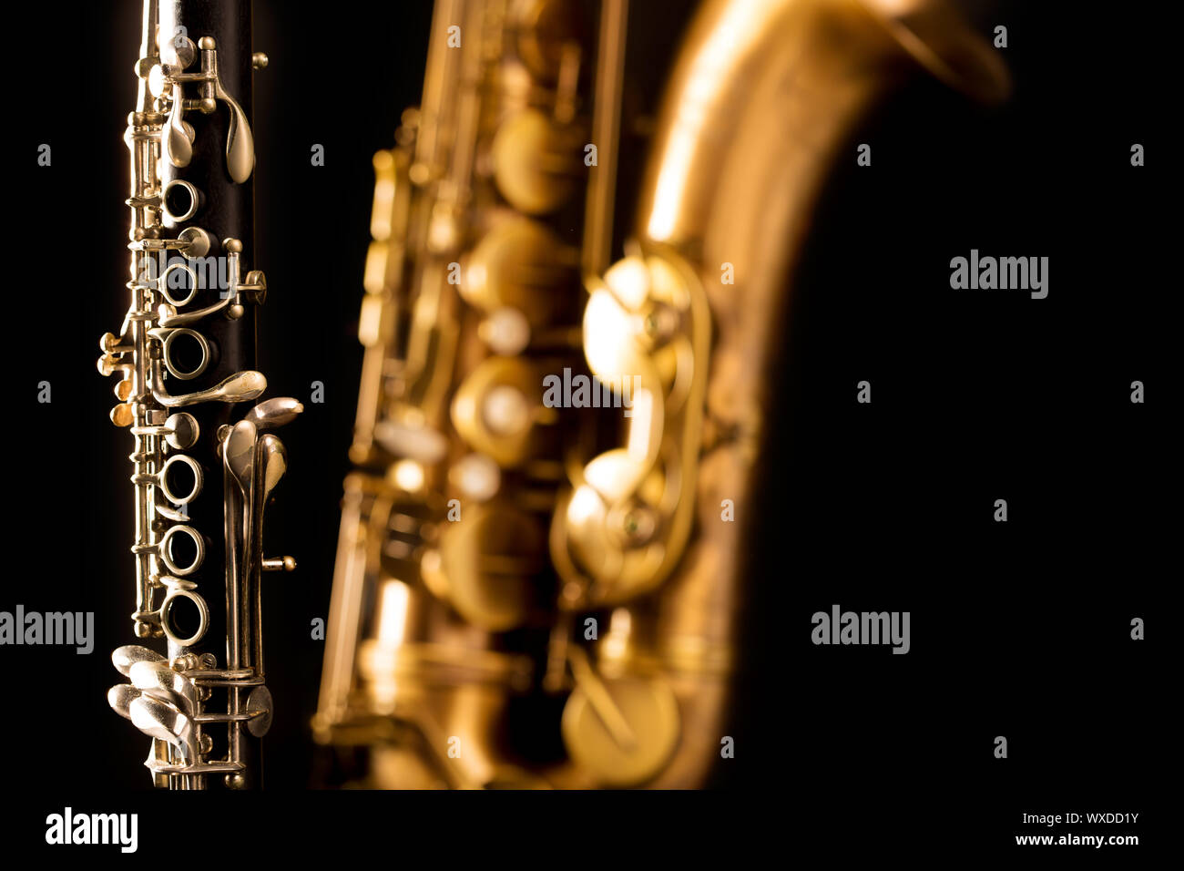 Classic music Sax tenor saxophone and clarinet in black background ...