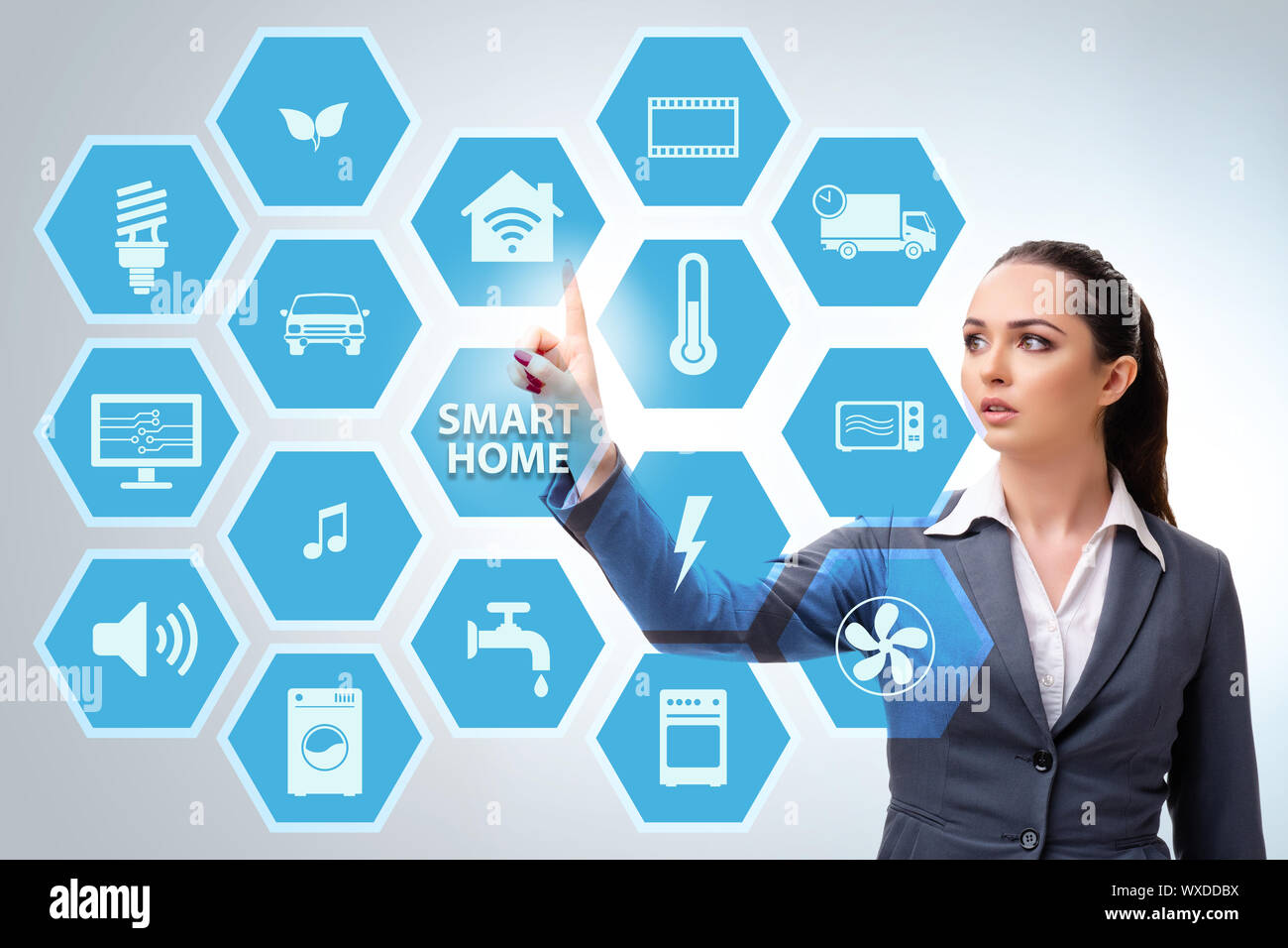 Smart home concept with woman Stock Photo - Alamy