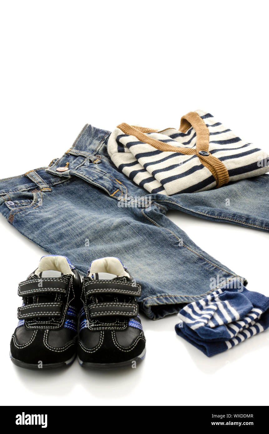 Prepared clothes for a baby boy isolated on a white background Stock ...