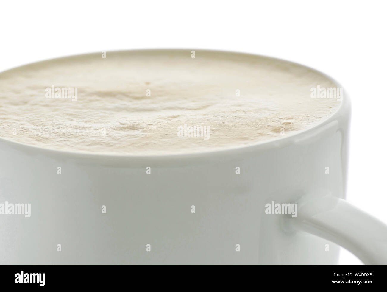 Closeup of a cafe latte isolated on a white background Stock Photo - Alamy