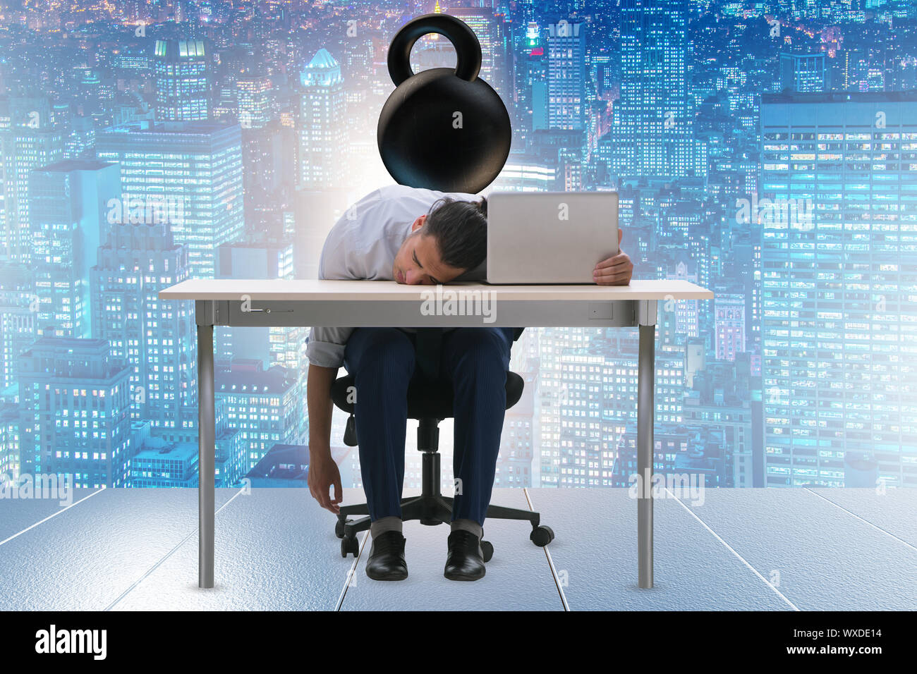 Employee with burden of work Stock Photo - Alamy