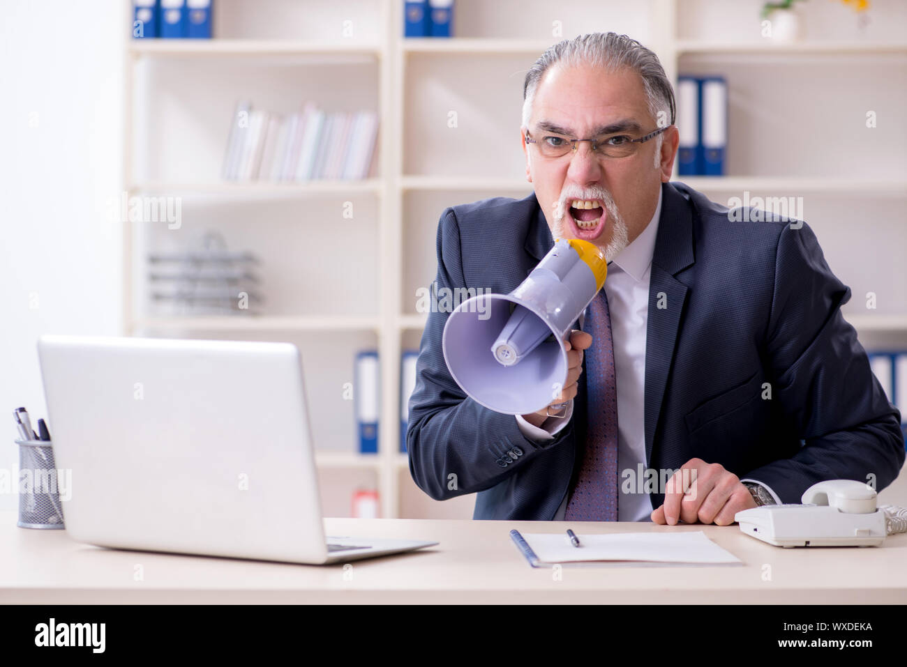 White bearded old businessman employee unhappy with excessive wo Stock ...