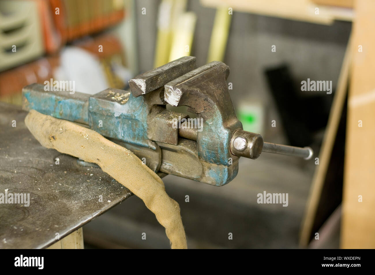 Metal clamp in the factory Stock Photo - Alamy
