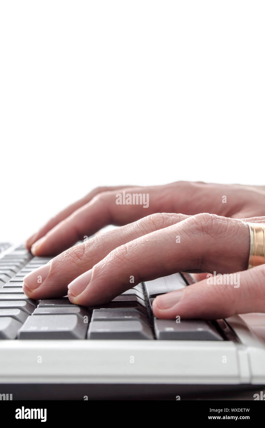 Typing hands on keyboard isolated over white background Stock Photo - Alamy