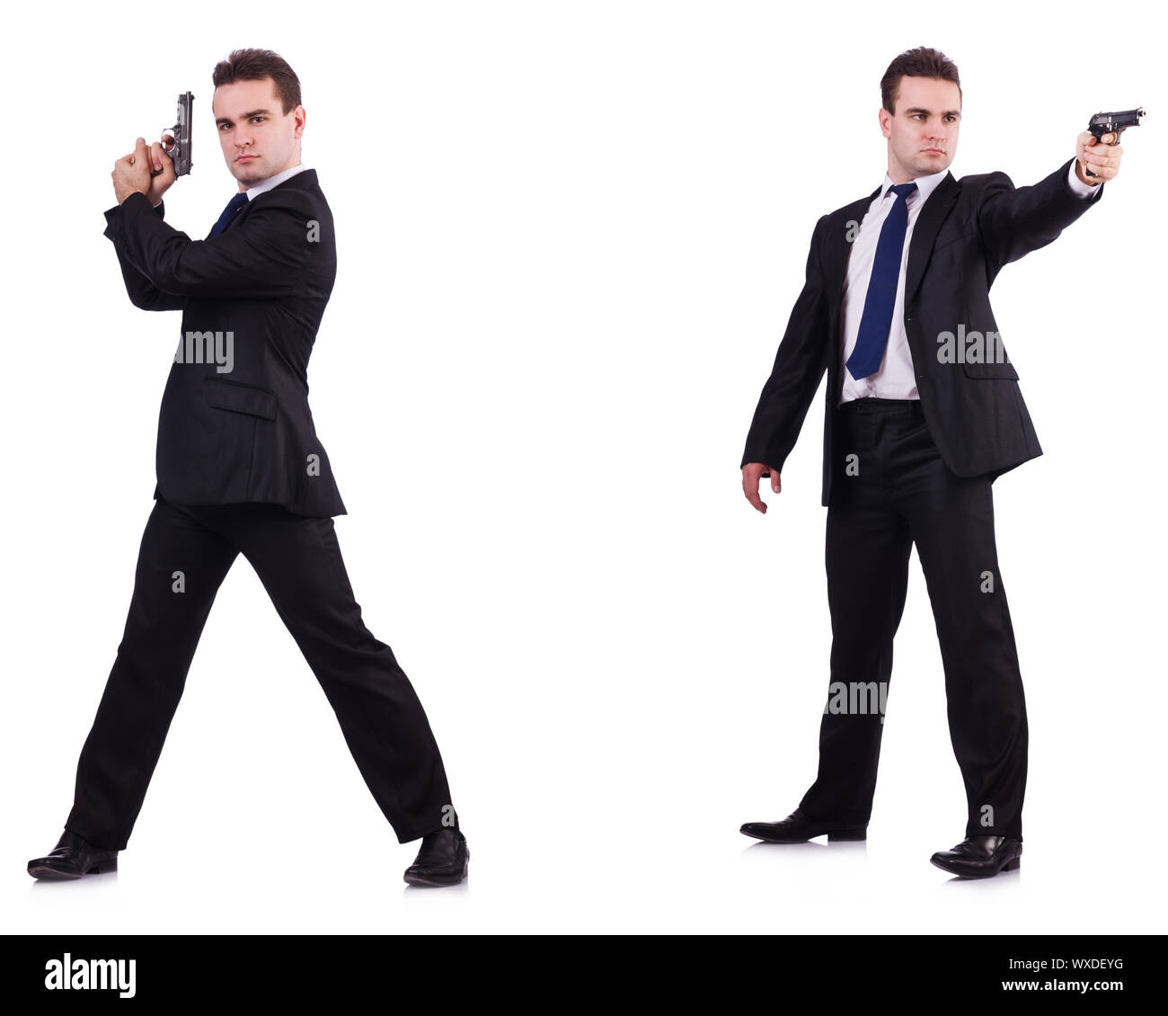 Man in suit with gun isolated on white Stock Photo - Alamy