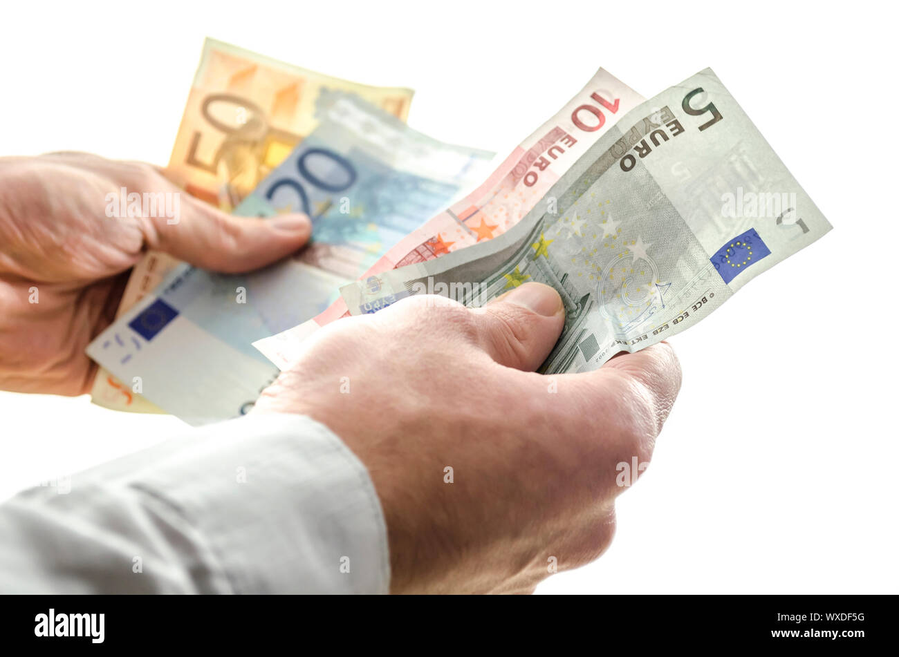 Man couting money banknotes. Isolated over white background Stock Photo ...