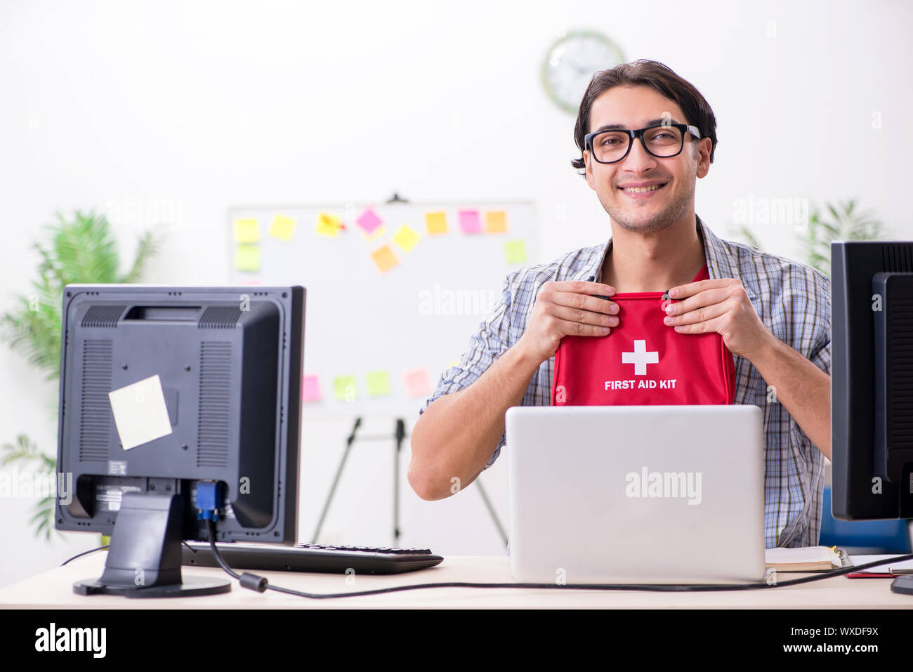 Male it specialist working in the office Stock Photo - Alamy