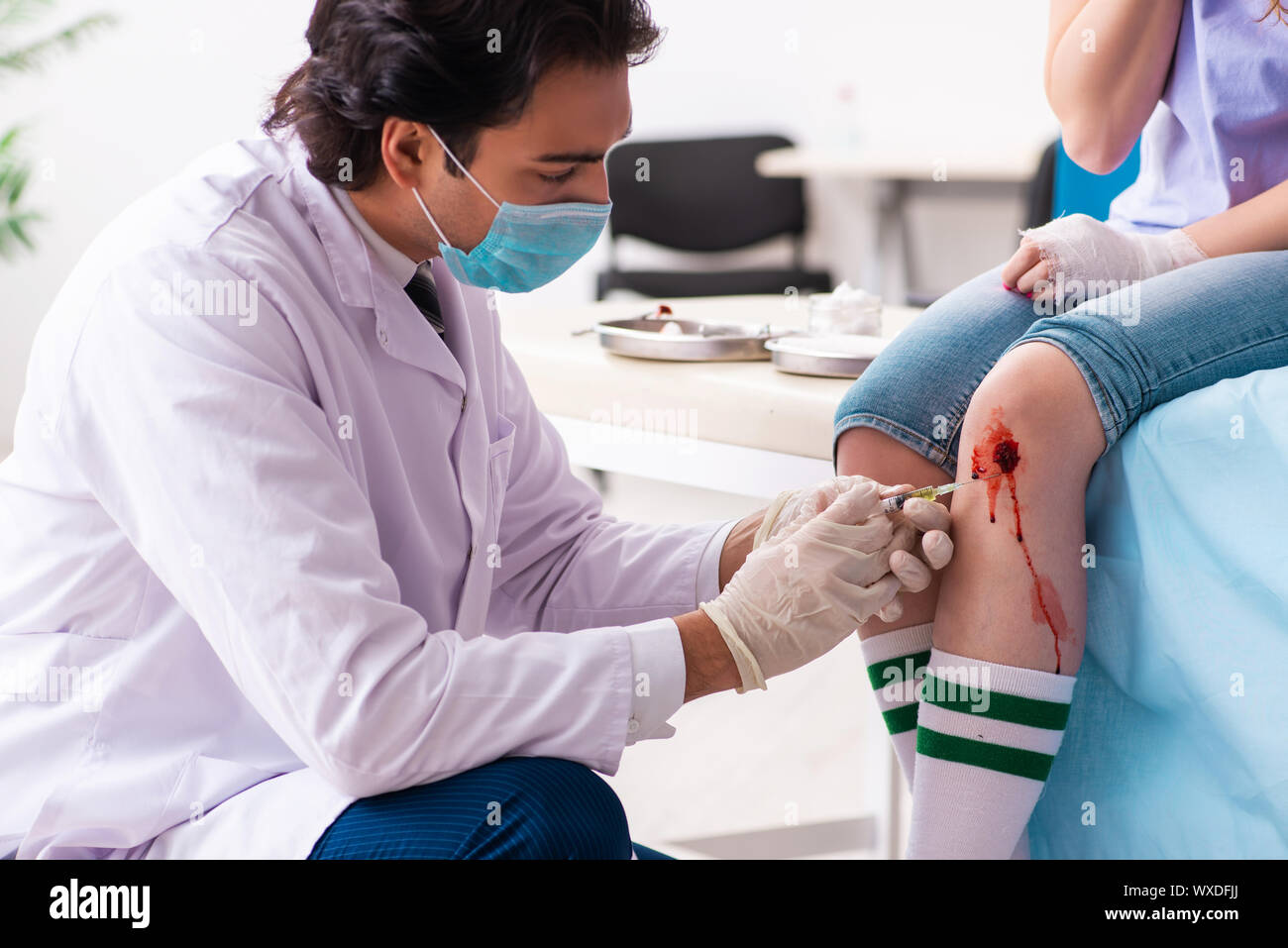 Woman cut wound leg hi-res stock photography and images - Alamy