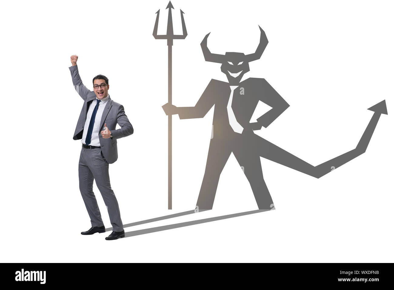 Devil hiding in the businessman - alter ego concept Stock Photo - Alamy