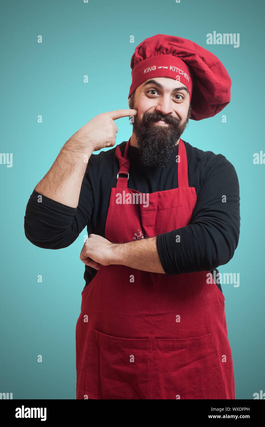 happy bearded chubby chef on blue background Stock Photo - Alamy