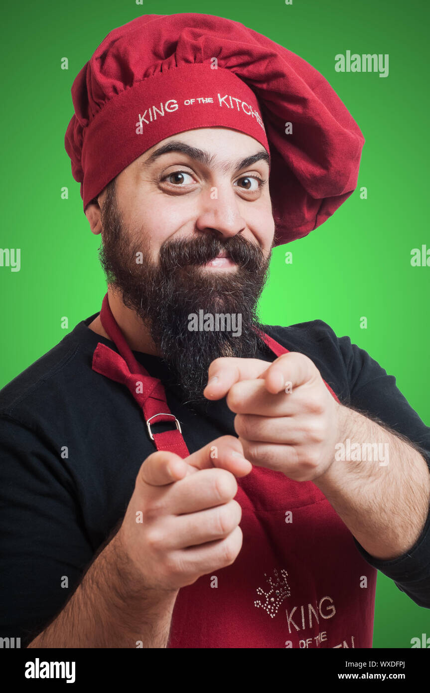 happy bearded chubby chef on green background Stock Photo - Alamy