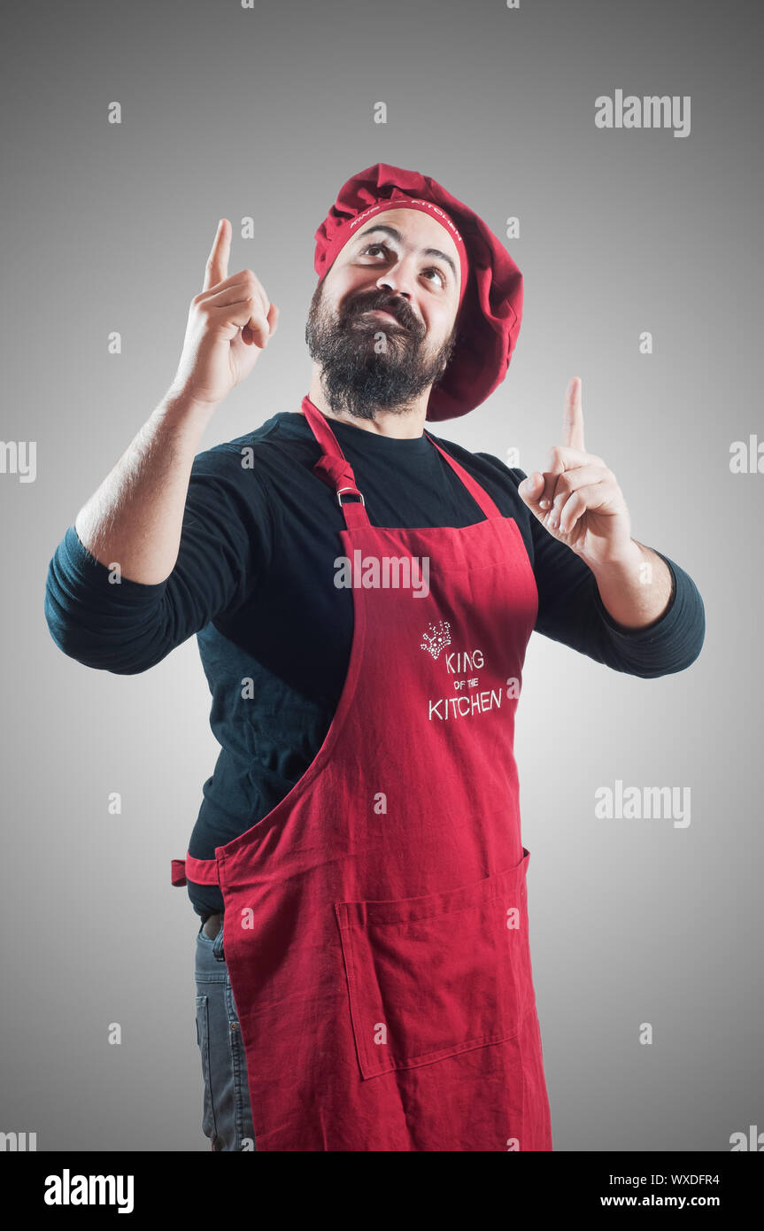 happy bearded chubby chef on gray background Stock Photo - Alamy
