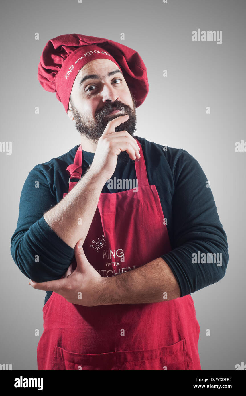 happy bearded chubby chef on gray background Stock Photo - Alamy