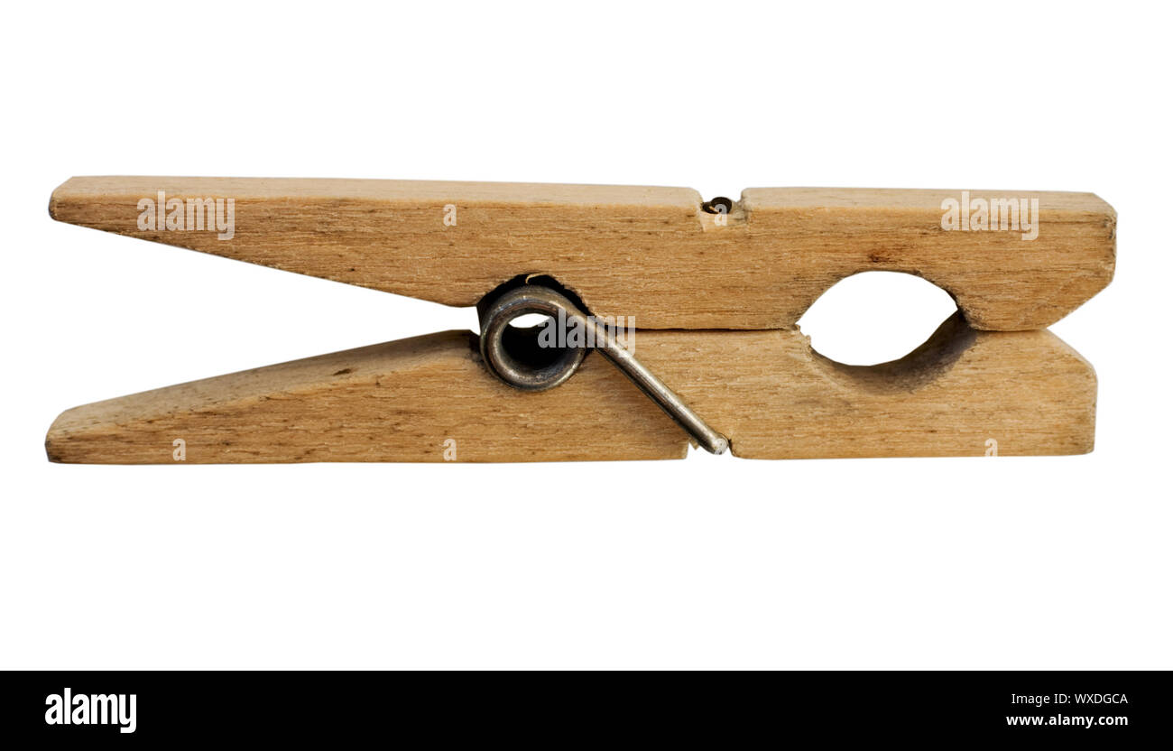Wooden beige clothes-peg on the white background Stock Photo - Alamy