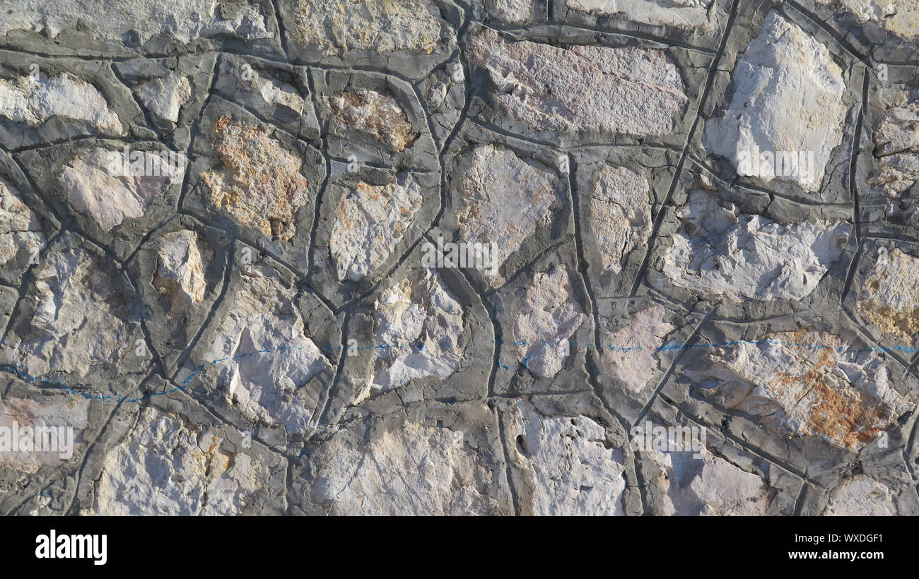 Closeup of grey Italian style Stone Cladding with scored cement joints ...