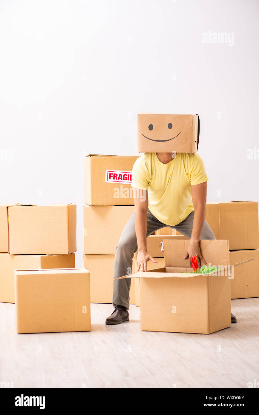 Happy man with box instead of his head Stock Photo - Alamy