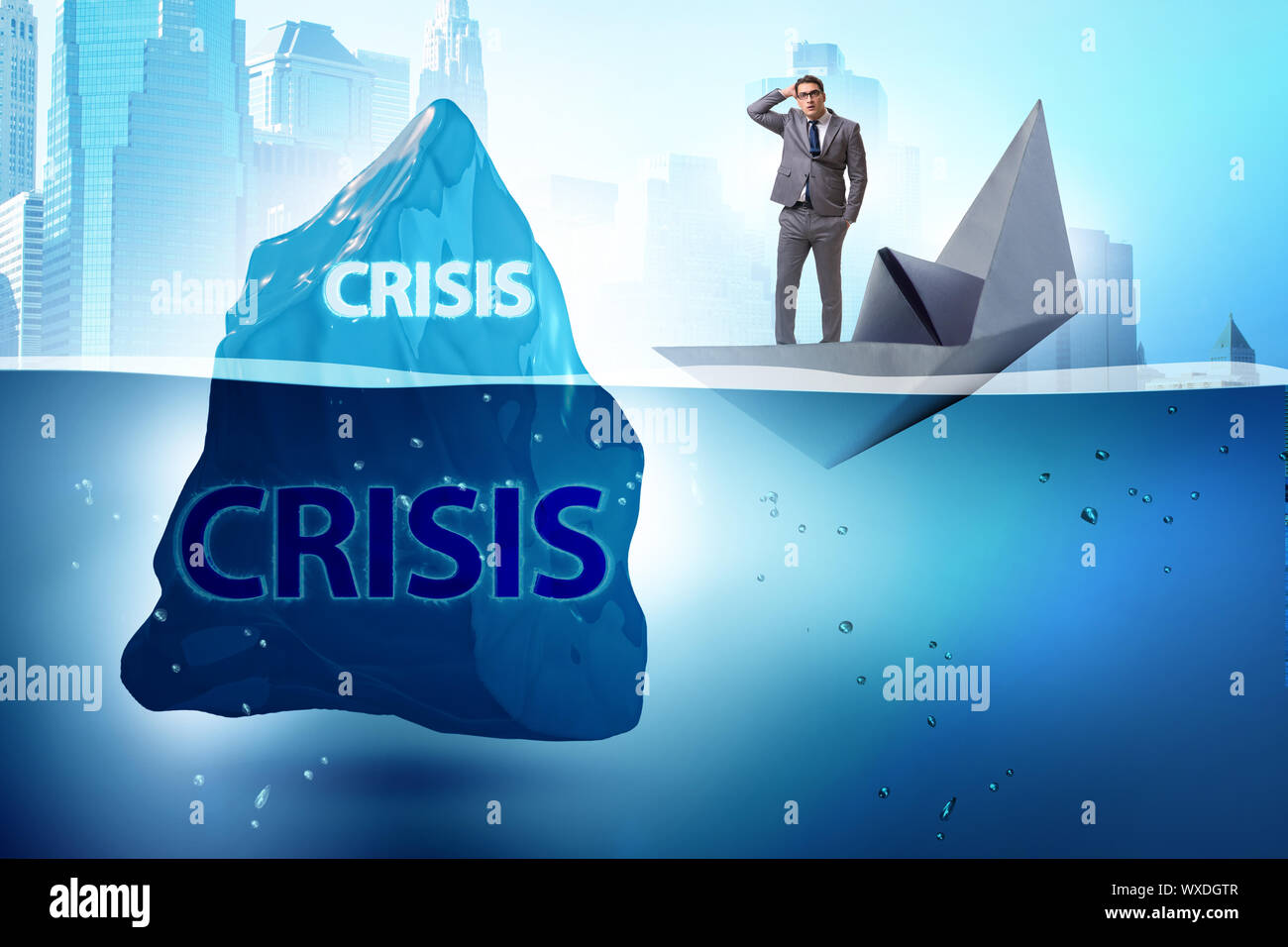 Crisis concept with businessman on iceberg Stock Photo - Alamy