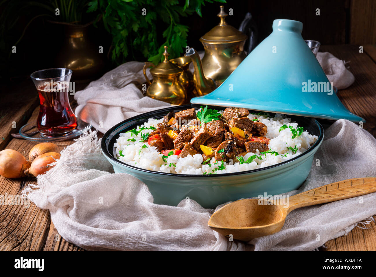 Tajin beef stew with rice paprika and sesame seeds Stock Photo - Alamy