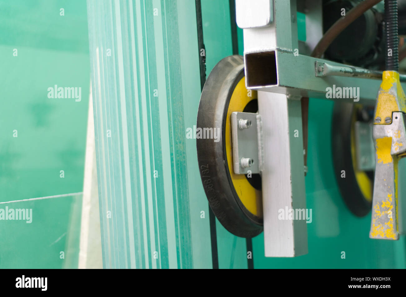 glass industry with tool to take the plates Stock Photo - Alamy