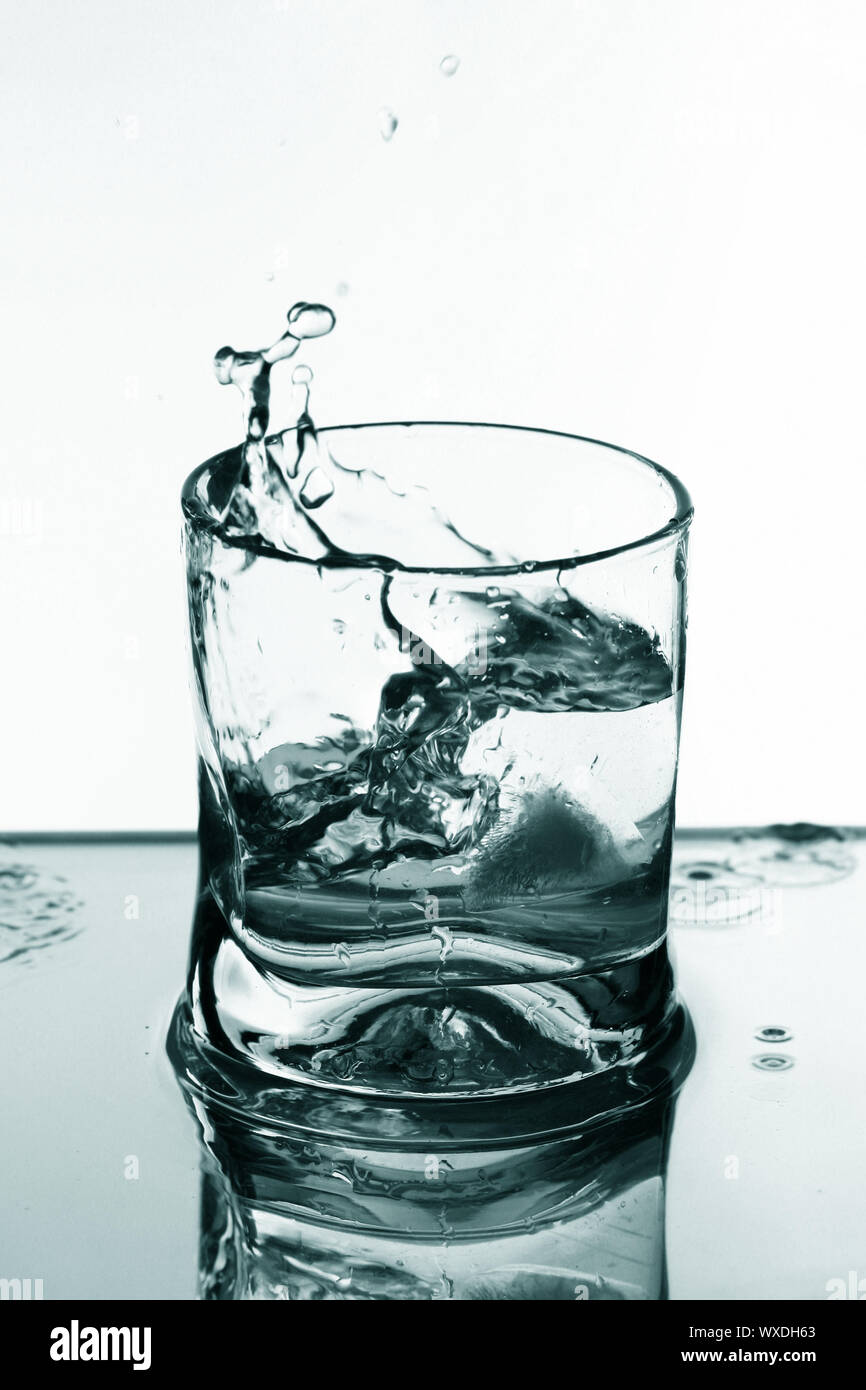 vodka alcohol elegant splash bar background Stock Photo - Alamy