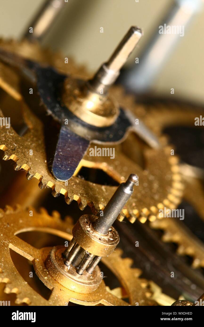 time gear inside my rare clock Stock Photo - Alamy