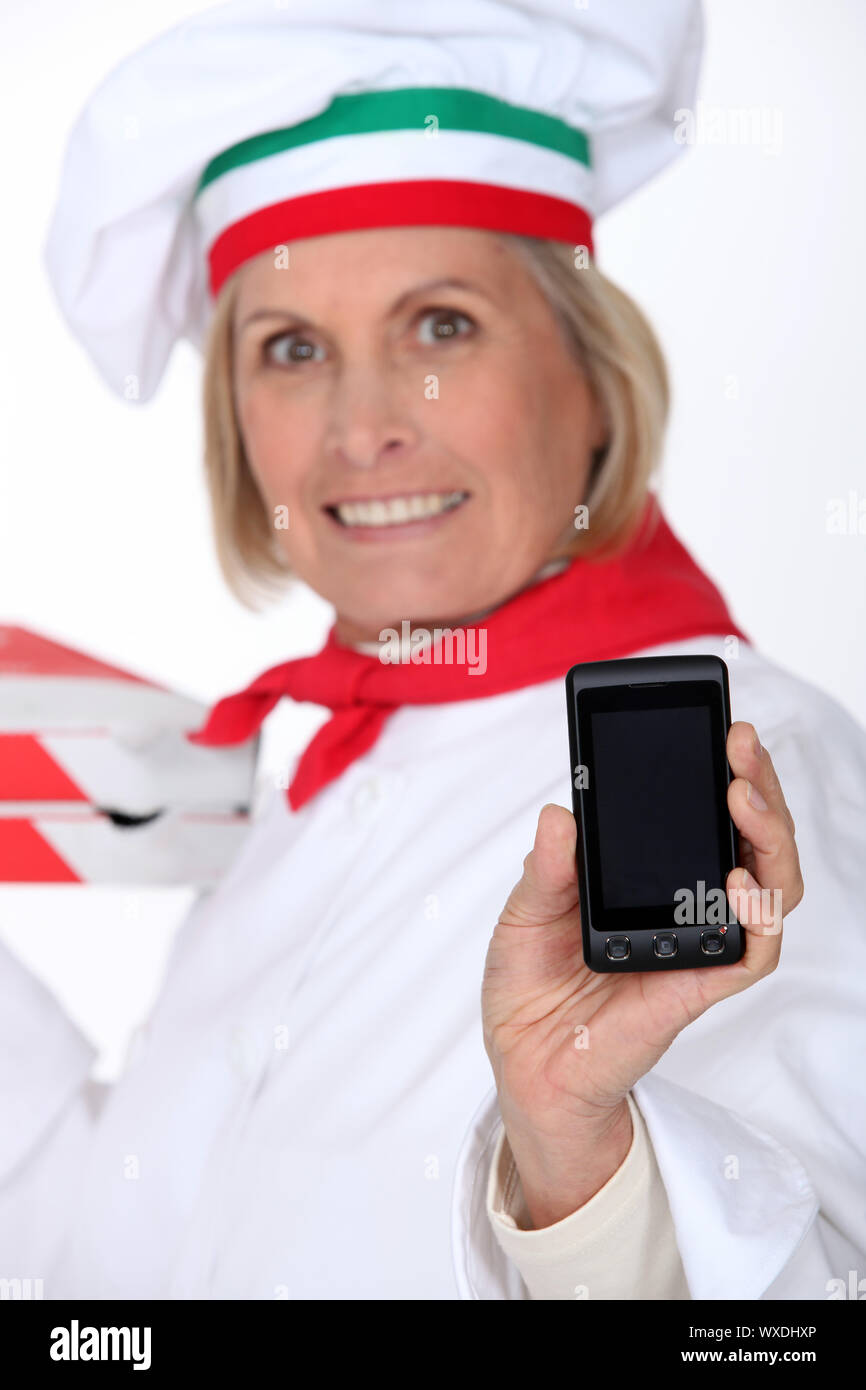 Cook showing phone hi-res stock photography and images - Alamy