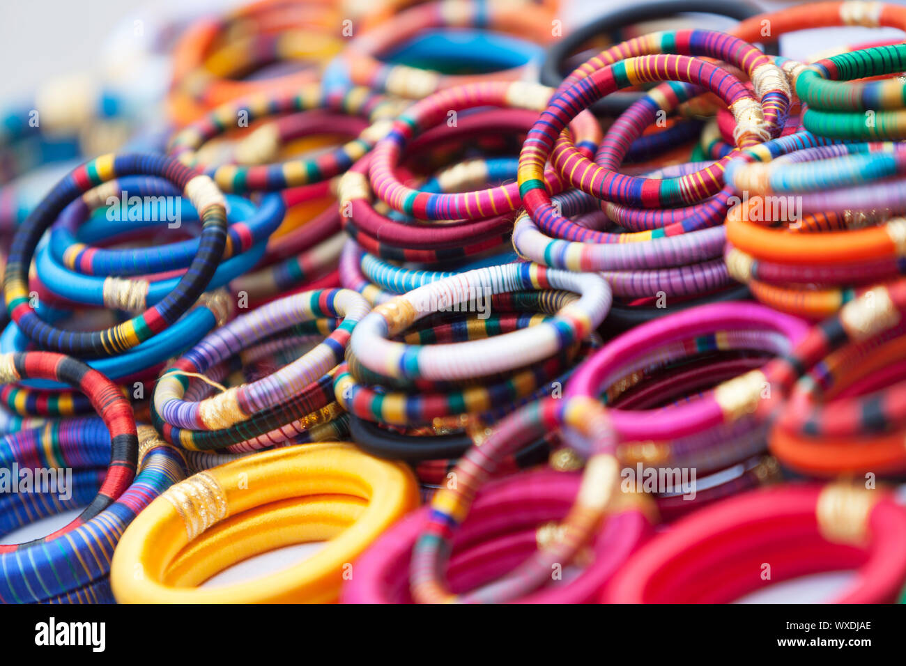 Traditional bangles in the local market in India Stock Photo - Alamy