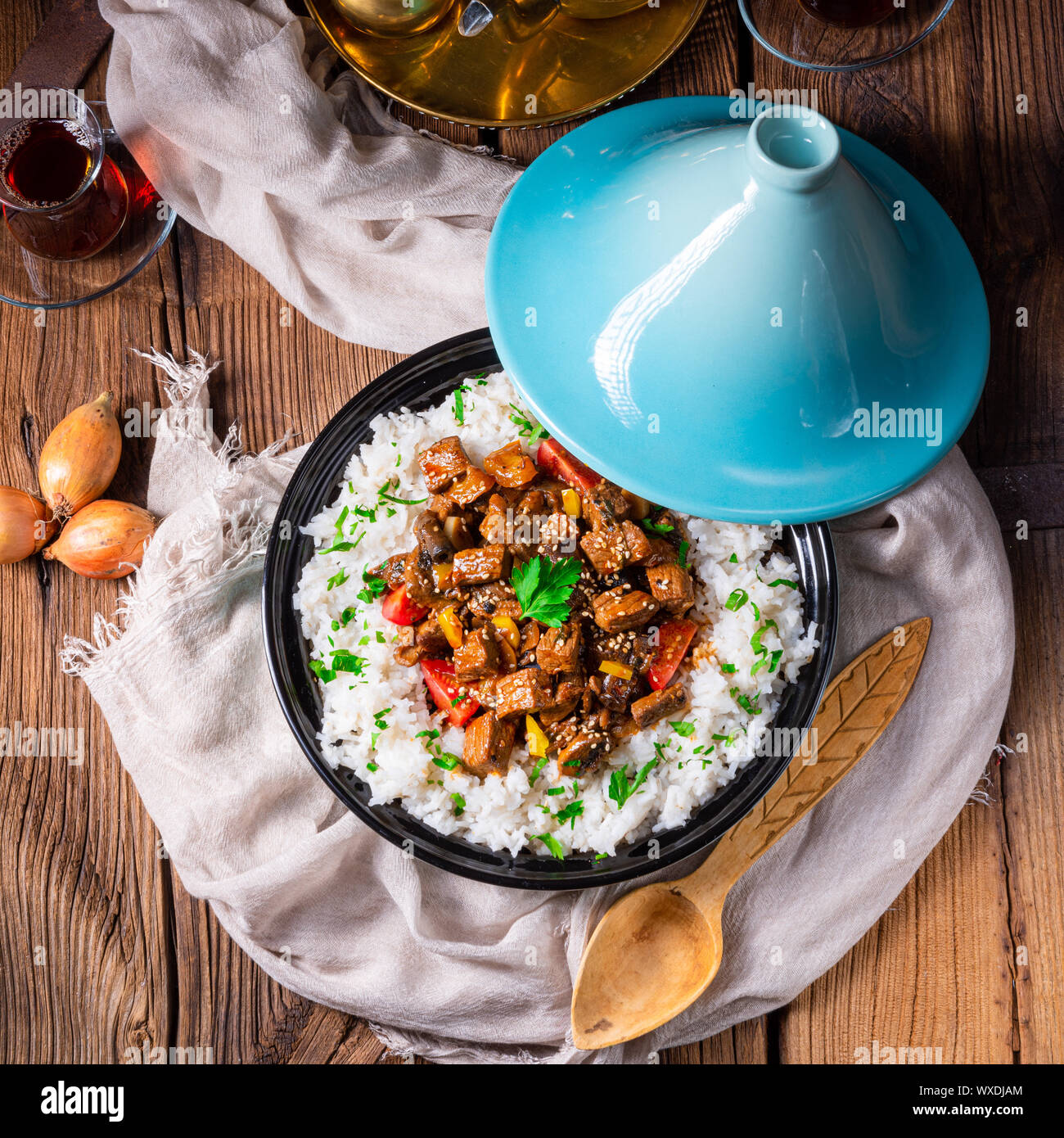 Tajin beef stew with rice paprika and sesame seeds Stock Photo - Alamy
