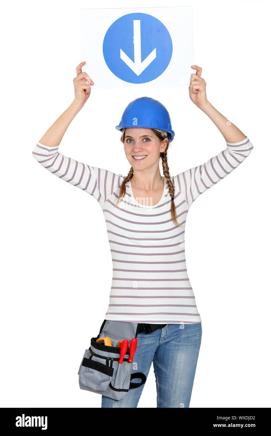 Woman holding a traffic sign Stock Photo - Alamy