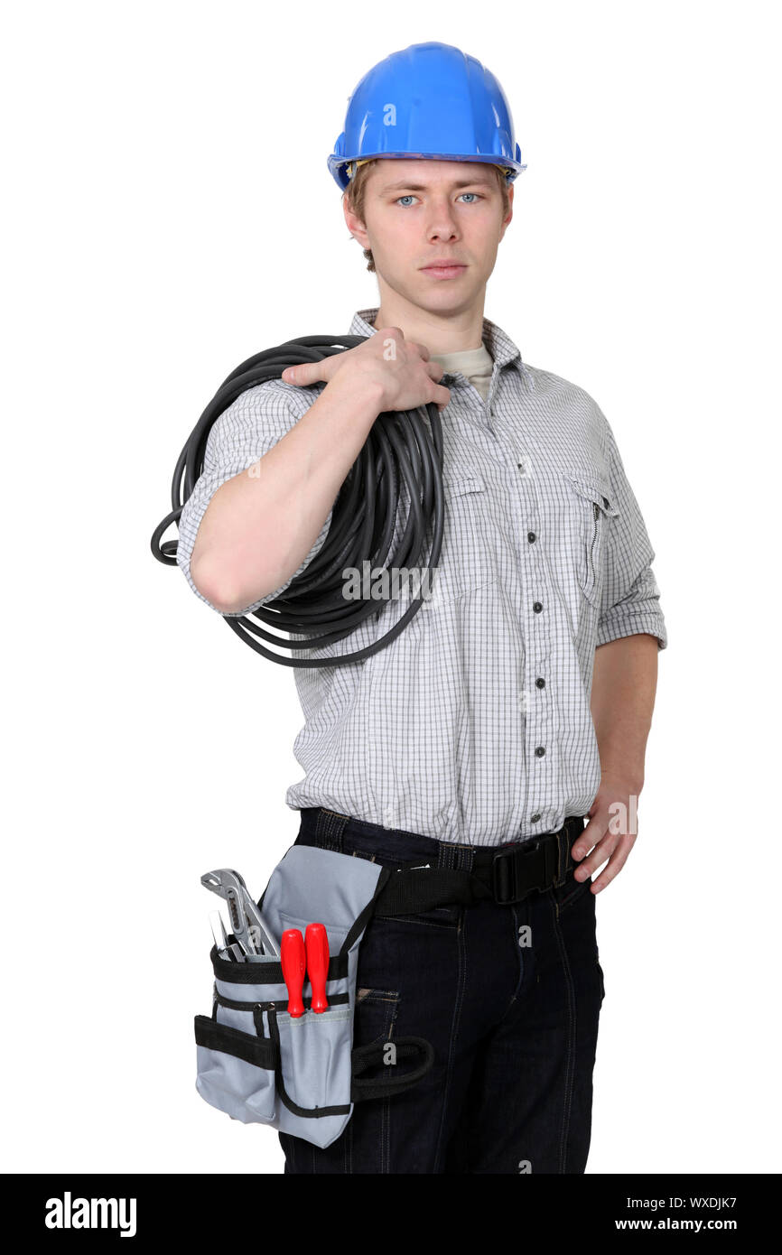 Electrician carrying wire coil Stock Photo - Alamy