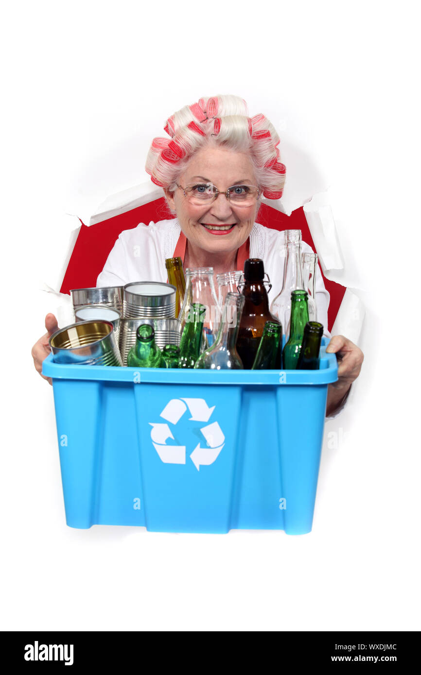 Old woman recycling Cut Out Stock Images & Pictures - Alamy