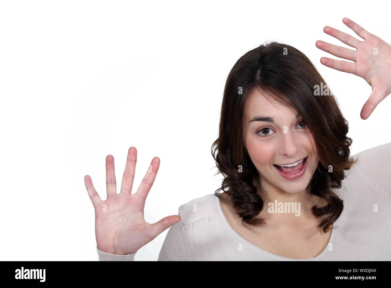 girl laughing and raising hands Stock Photo - Alamy