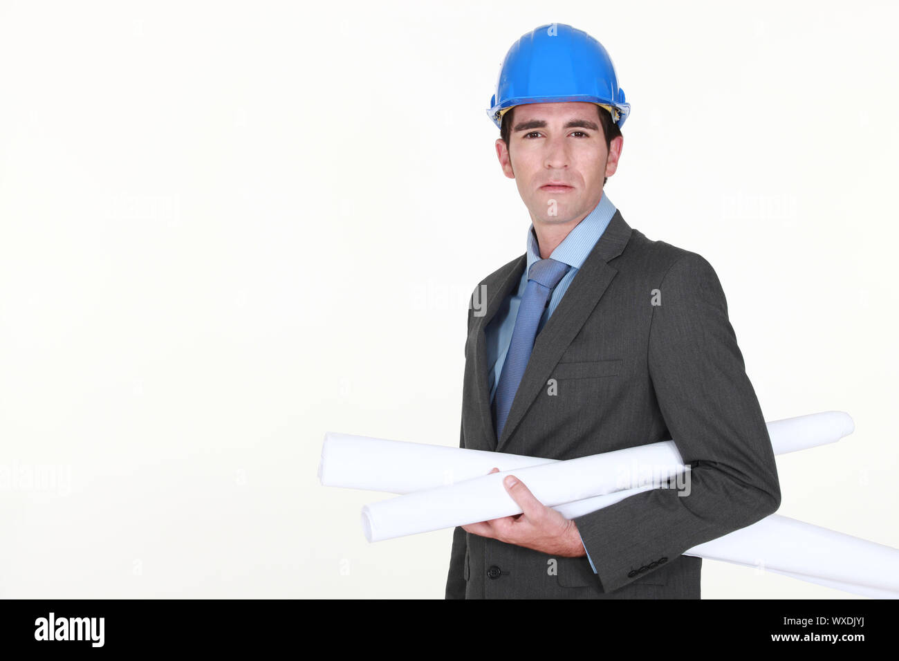 portrait of architect holding blueprints isolated on white Stock Photo ...