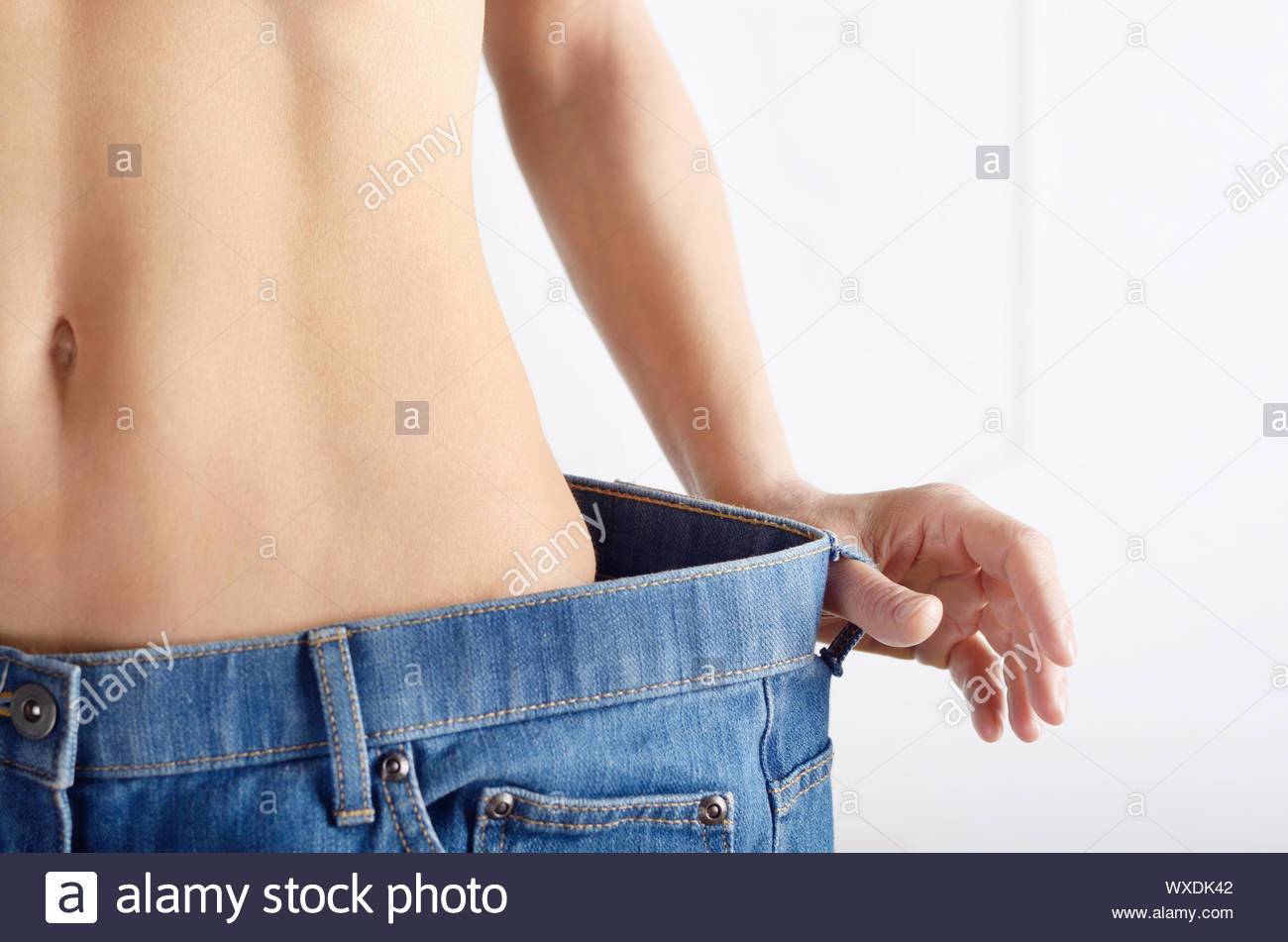 Slim Woman Stomach Stock Photos & Slim Woman Stomach Stock Images - Alamy