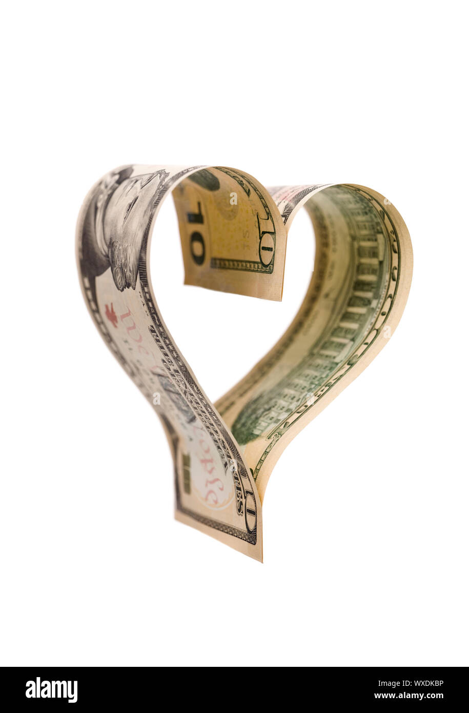 Heartshaped money isolated on white background Stock Photo - Alamy