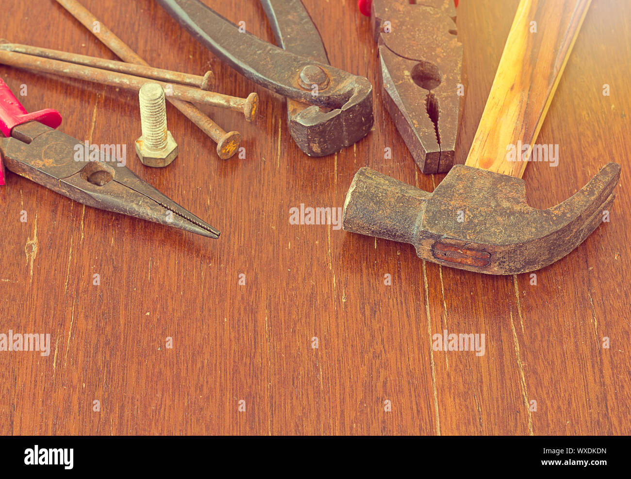Old tools on wood background, old equipment concept, vintage and retro ...