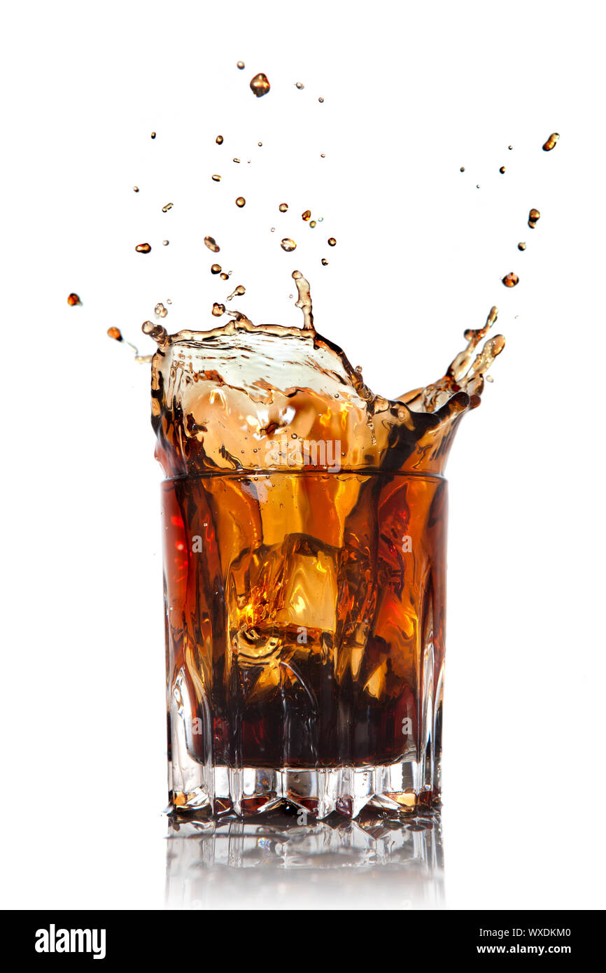 splash of cola in glass isolated on white Stock Photo - Alamy