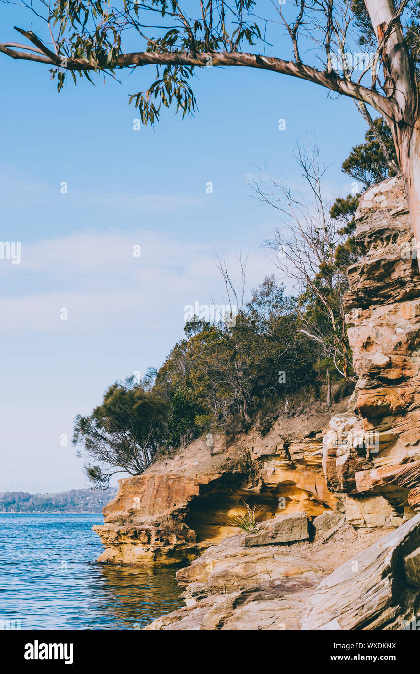 view of Conningham Beach in Tasmania, Australia with sunshine and no ...
