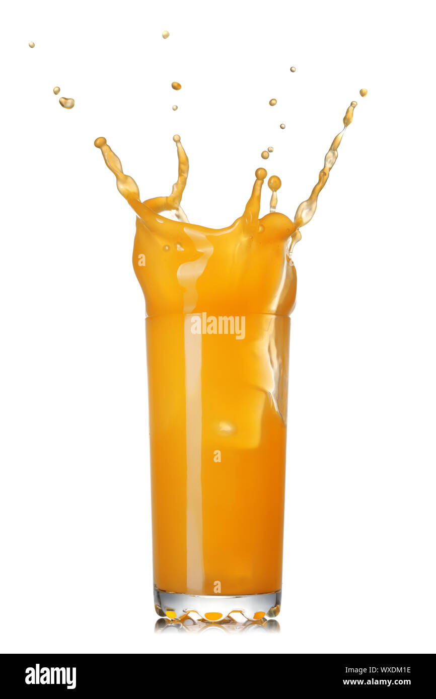 orange juice splash in the glass isolated on white Stock Photo - Alamy