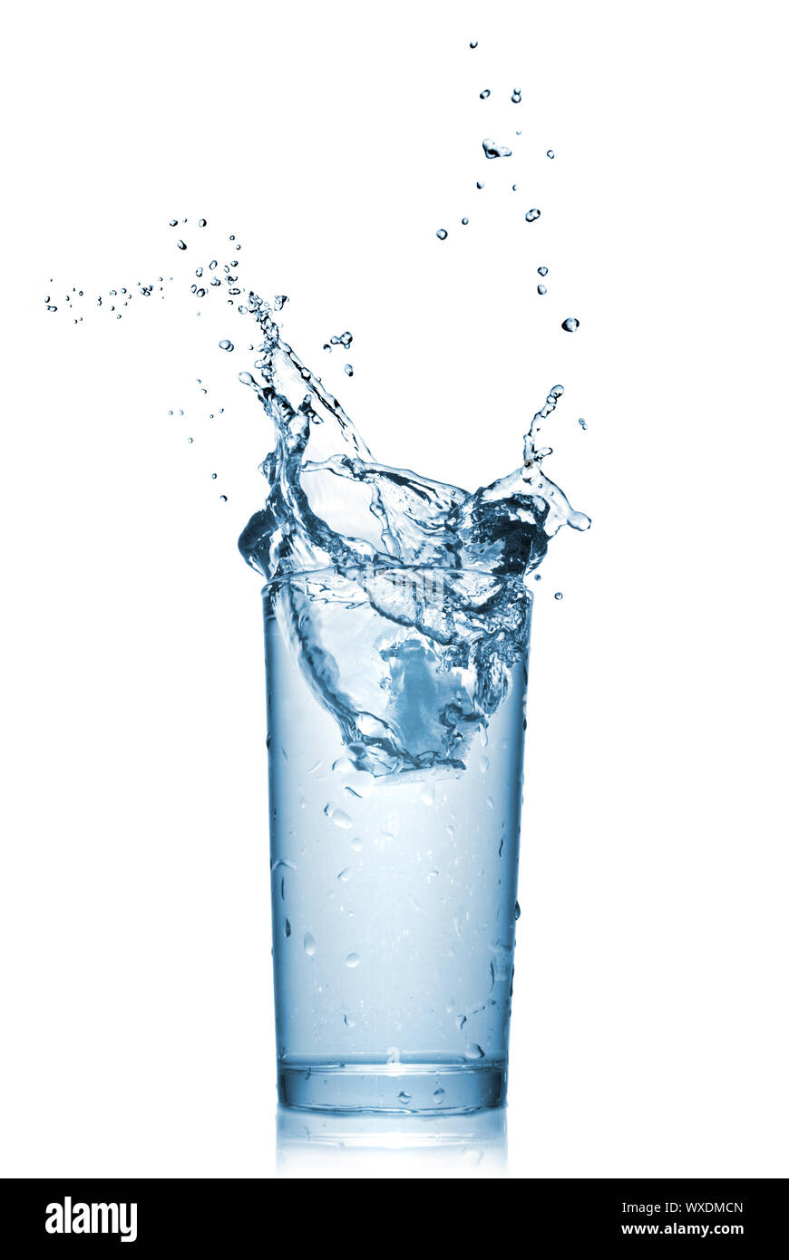 water splash in glass isolated on white Stock Photo - Alamy