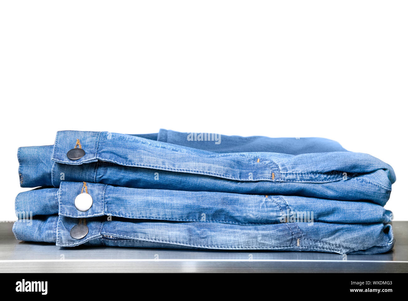blue jeans in store isolated on white Stock Photo - Alamy