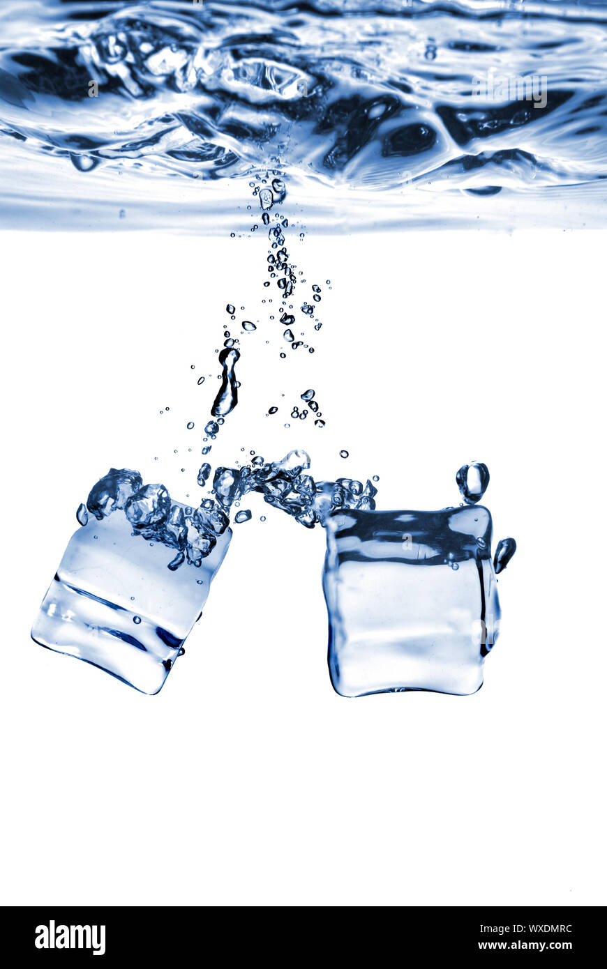 ice cubes dropped into water with bubbles isolated on white Stock Photo ...