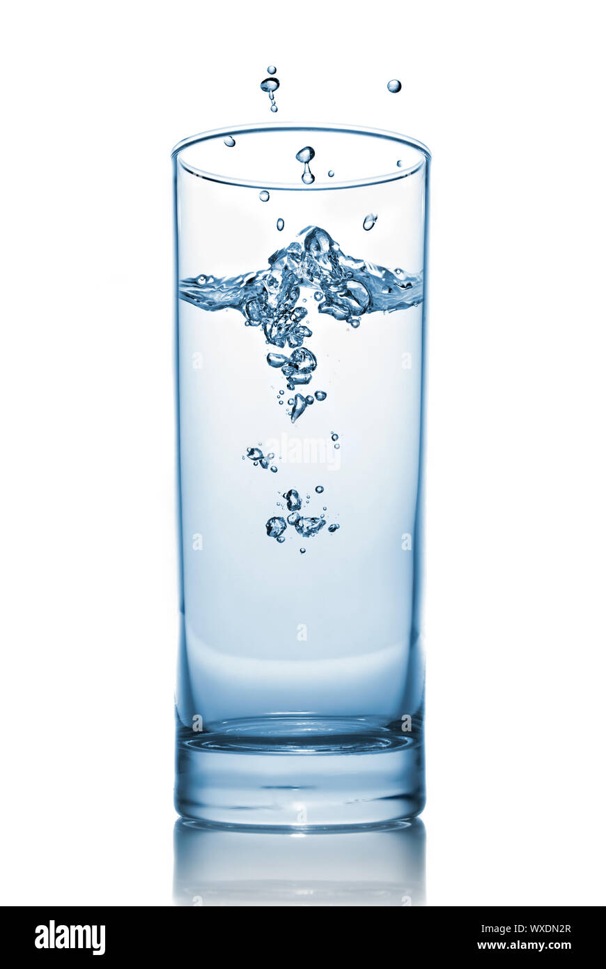 water splash in glass isolated on white Stock Photo - Alamy