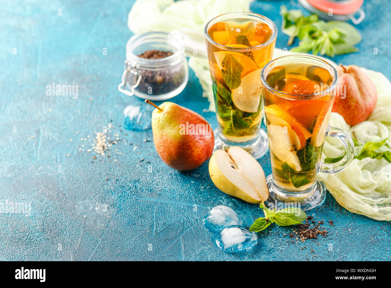 Ice tea with mint leaves and pear Stock Photo - Alamy