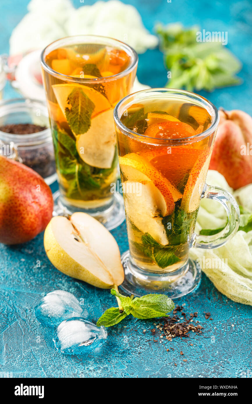 Ice tea with mint leaves and pear Stock Photo - Alamy