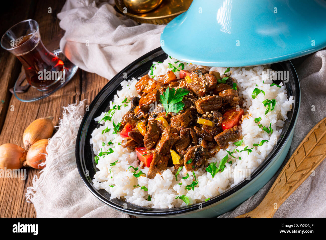Tajin beef stew with rice paprika and sesame seeds Stock Photo - Alamy